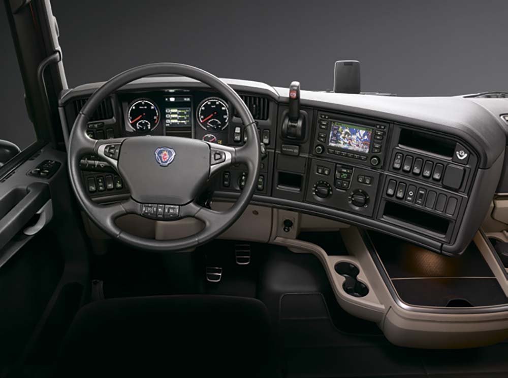 Огляд тривісного сідельного тягача Scania R500